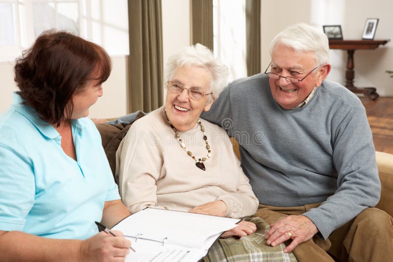 Senior Couple in Discussion with Health Visitor Stock Image - Image of ...