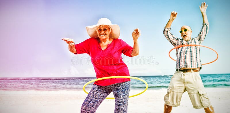 Senior Couple Doing Hula Hoop Stock Image - Image of connection ...