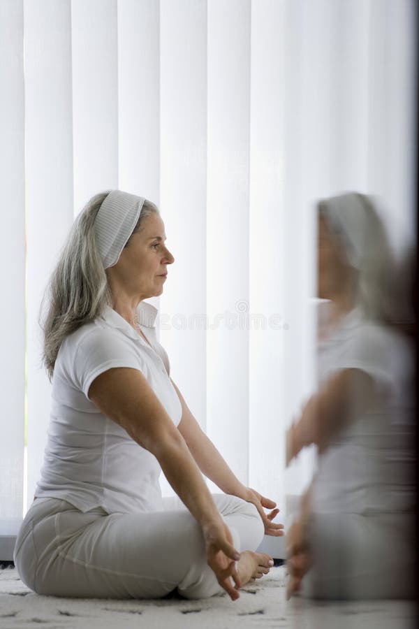 Senior couple doing yoga stock photo. Image of lifestyle - 41721752 Senior couple doing yoga stock photo. Image of lifestyle - 41721752