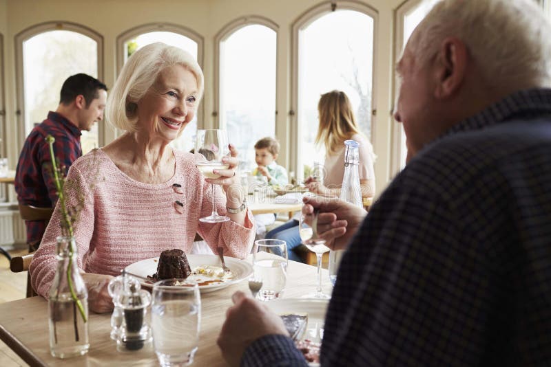Senior Couple Enjoying Dessert in Restaurant Together Stock Image ...