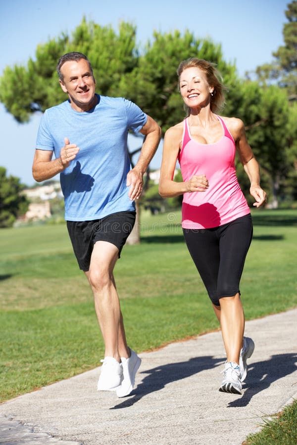 Happy jogging couple. stock image. Image of recreation - 31666089
