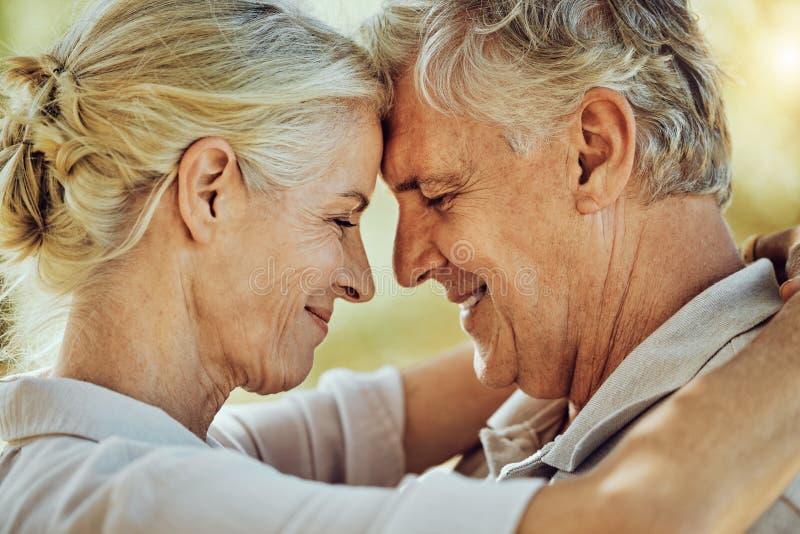 Senior Couple Face And Forehead Touch With Love Care Or Commitment In