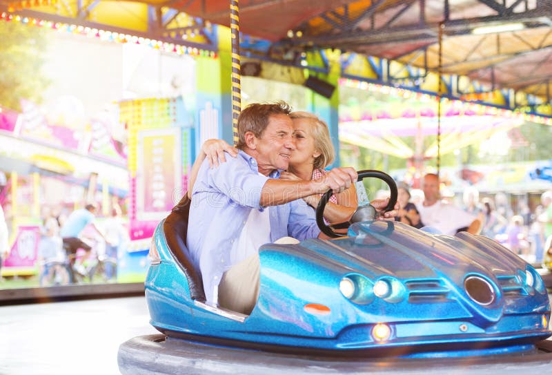 Senior Couple at the Fun Fair Stock Photo - Image of friendship ...