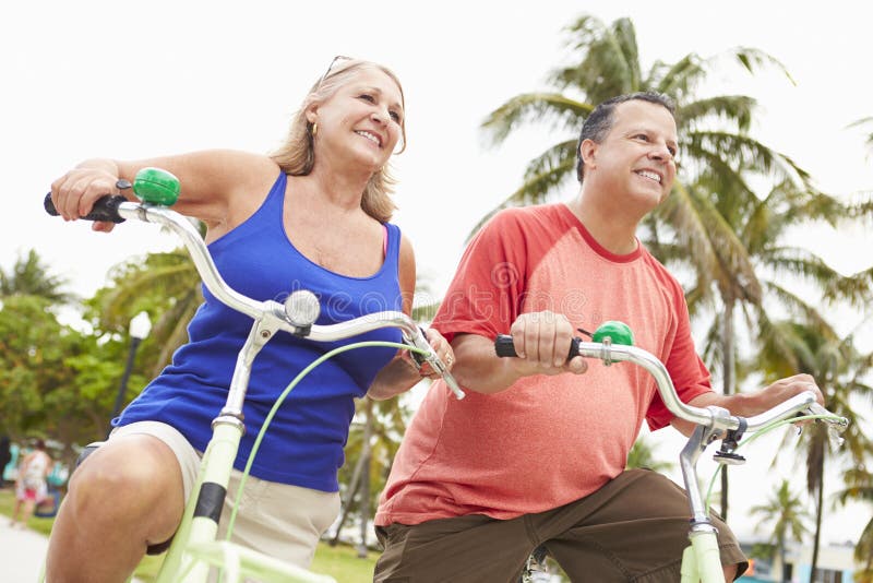 Senior Couple Having Fun on Bicycle Ride Stock Image - Image of ...