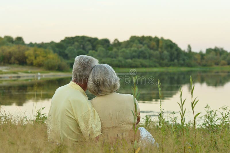 Senior Couple Hugging in the Park, Back View Stock Image - Image of ...
