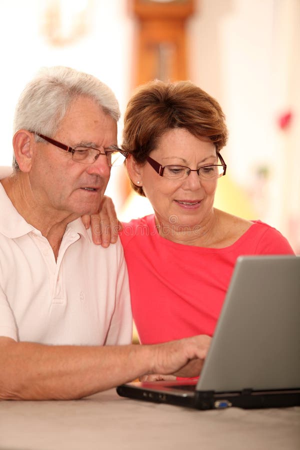 Senior Couple Using Internet Stock Photo - Image of retired, portrait ...