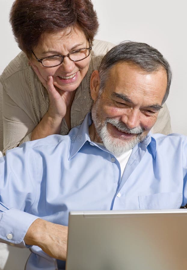 Happy Mature Couple Working on Laptop Stock Image - Image of husband ...