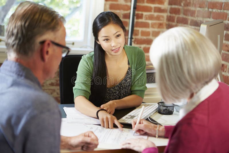 Senior Couple Meeting with Financial Advisor in Office Stock Image ...