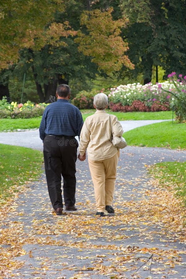 Senior Couple in Park stock photo. Image of park, active - 1354128