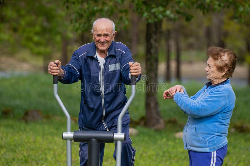 Senior couple doing sport stock photo. Image of energy - 346838700