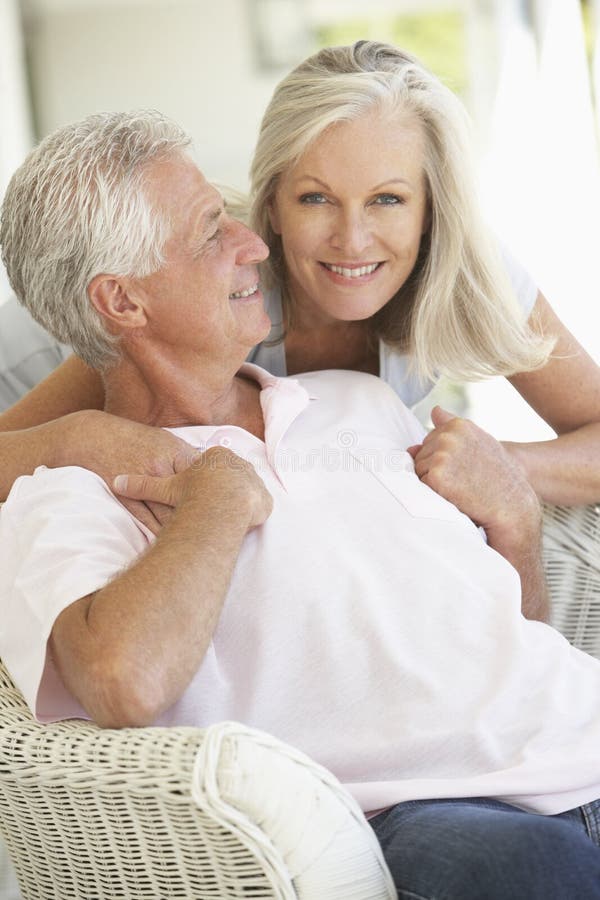 Senior Couple Relaxing Together Stock Photo - Image of embracing ...