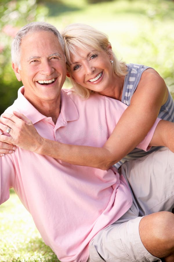 Happy Senior Couple at the Wheel of a Sail Boat Stock Image - Image of ...