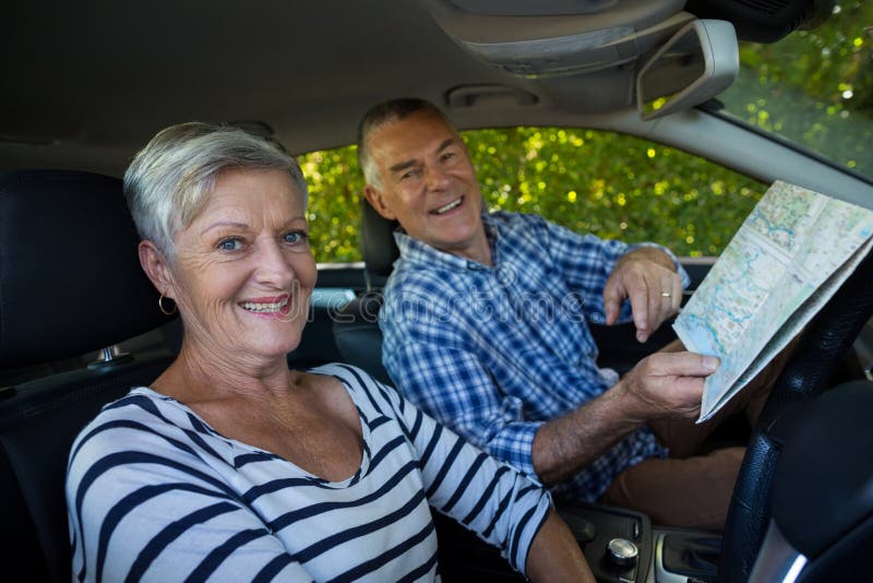 Senior Couple with Road Map in Car Stock Image - Image of driving ...