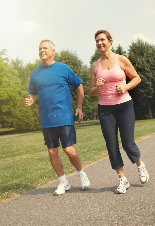 Happy jogging couple. stock image. Image of recreation - 31666089