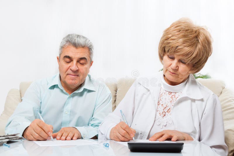 Older Couple Signing Paper Female Agent Stock Photos - Free & Royalty ...