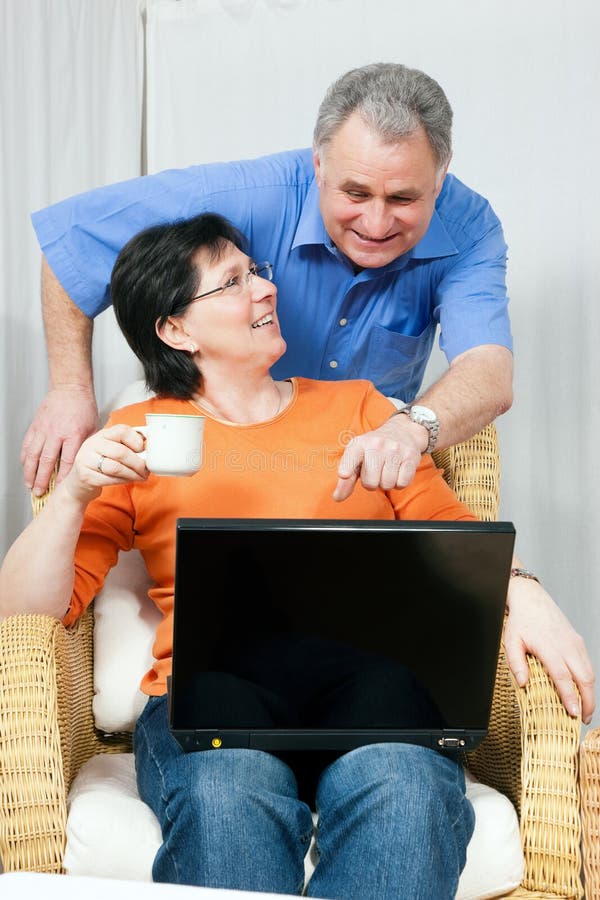 Senior Couple Surfing Internet Stock Photo - Image of explaining, mail ...