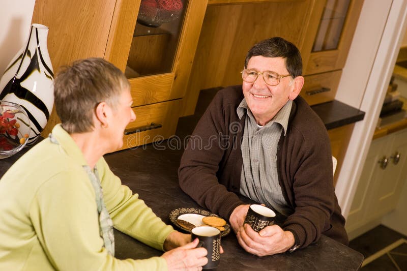 Senior Couple with Moving Boxes Stock Image - Image of full, indoors ...