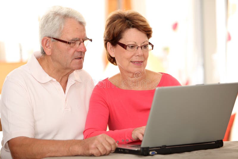 Senior Couple Using Internet Stock Photo - Image of retired, portrait ...