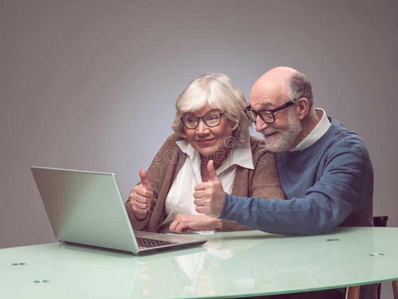 Senior Couple Using Laptop Together Stock Image - Image of aged ...