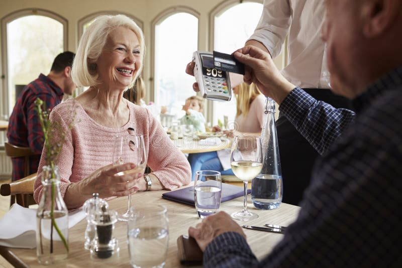 Paying Restaurant Bill with a Credit Card Stock Photo - Image of life ...