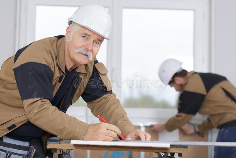 Senior Craftsman Working with Labor Protection at Carpentry Shop Stock ...