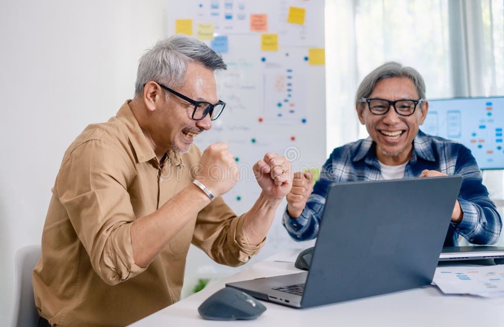 Senior Developer Team Celebrates Success in Software Collaboration and ...