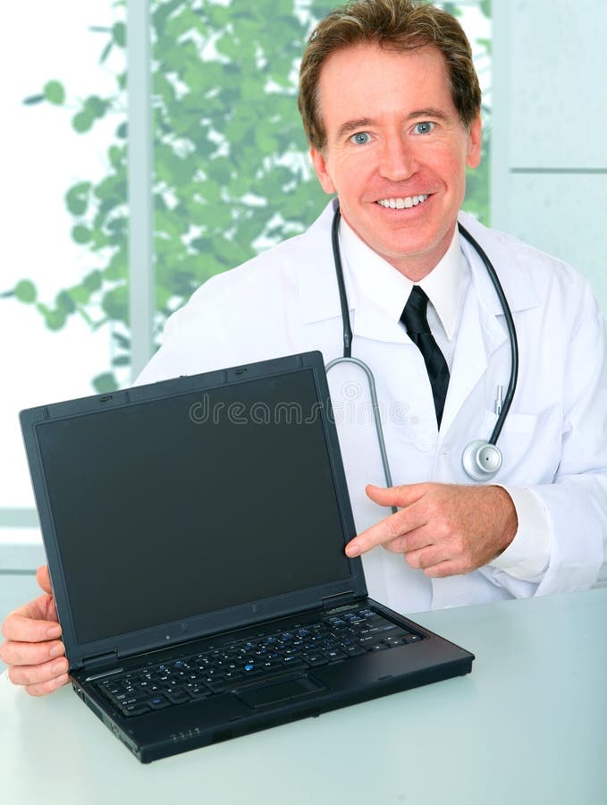 Doctor with Laptop and Couple in Doctor S Office Stock Photo - Image of ...