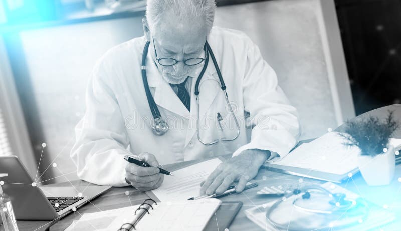 Senior Doctor Reading a Clinical Record Light Effect Stock Photo ...