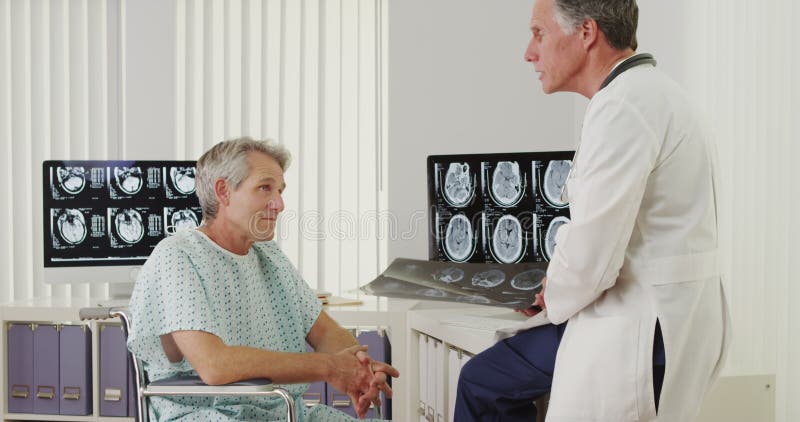 Senior Doctor Talking with Disabled Elderly Patient Stock Video - Video ...