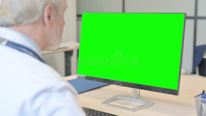 Senior Doctor Using Desktop with Green Screen Stock Video - Video of ...