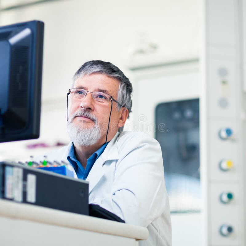 Senior Doctor Using His Tablet Computer Stock Image - Image of hospital ...