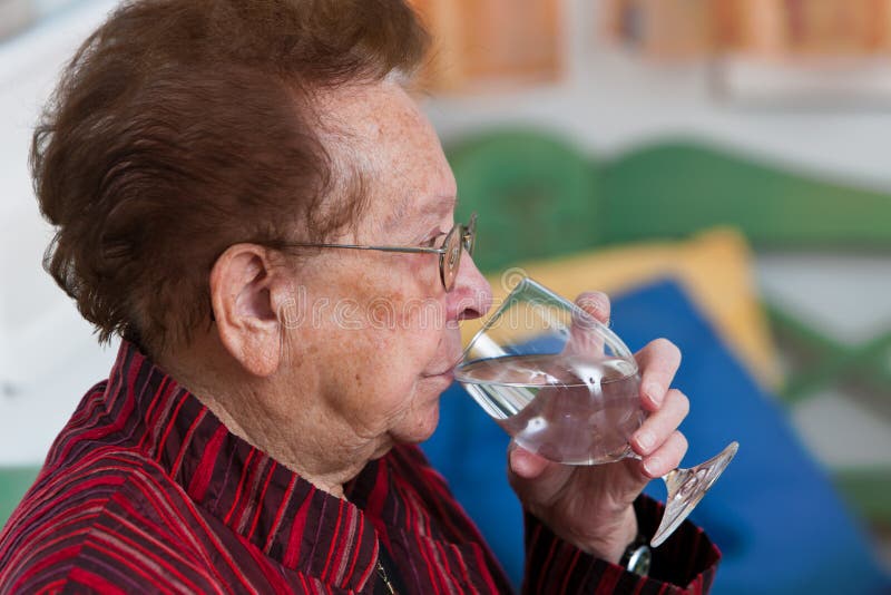 Senior Drinking Water from a Glass Stock Photo - Image of pensioner ...