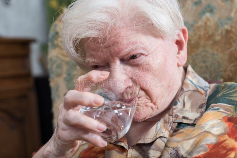 Senior drinking water stock photo. Image of home, healthy - 67874574