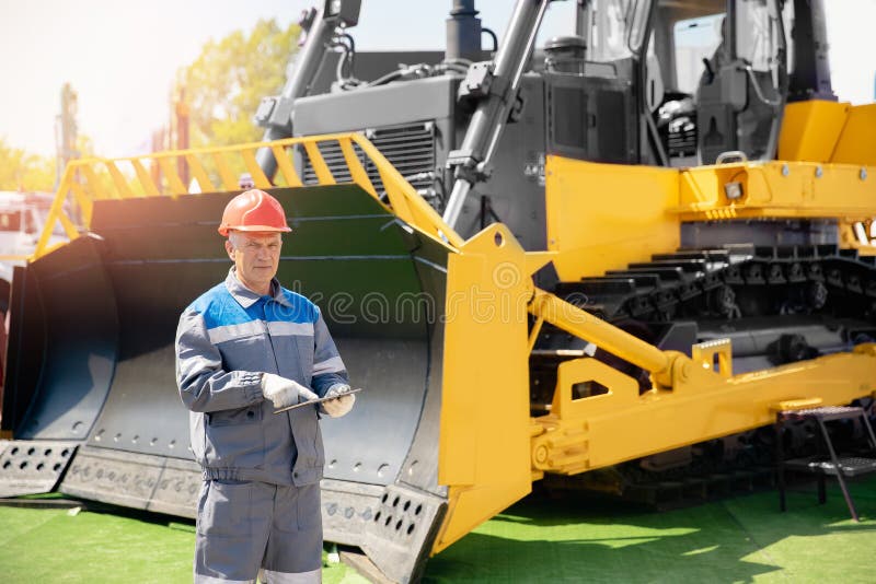 Industrial Portrait of Working Man, Excavator Driver Climbs into Cab To ...