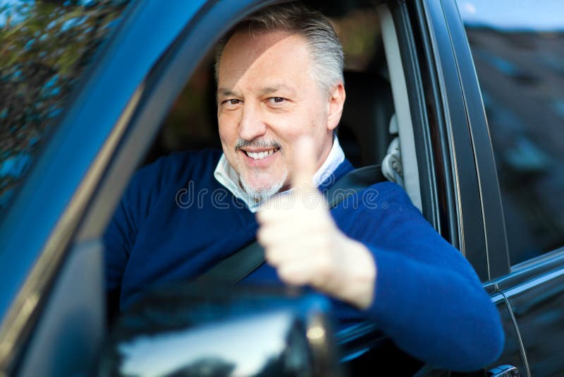 Man driving his car stock image. Image of mature, technology - 44340977