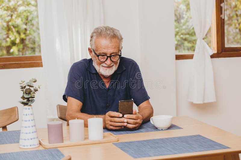 Senior Elder Old Man Happy To Use Smartphone Watching or Video Calling ...