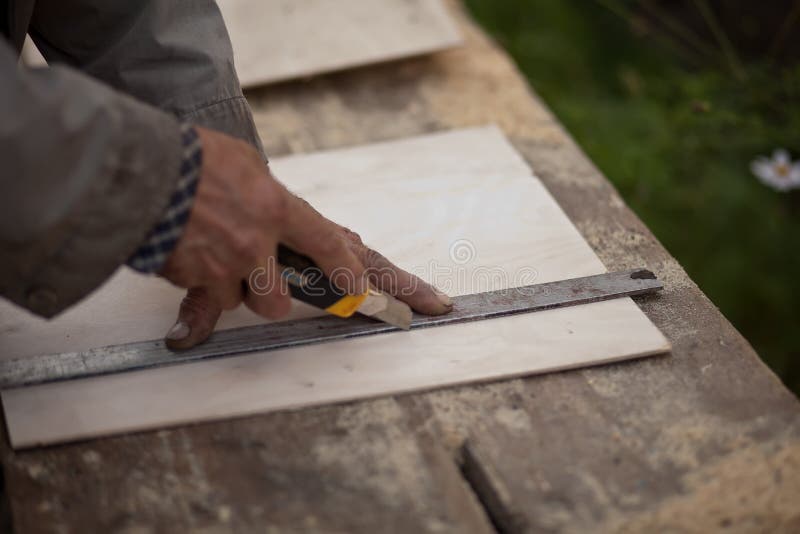 Carpenter Using Ruler To Draw Line Marking Stock Photos - Free ...