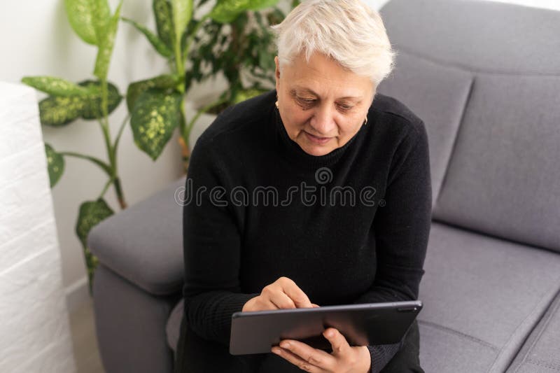 Senior Elderly Woman Using Tablet Stock Image - Image of casual ...