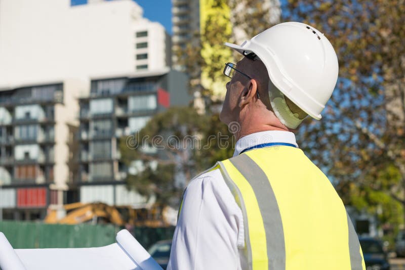 Senior engineer stock image. Image of paper, home, engineer - 197996393