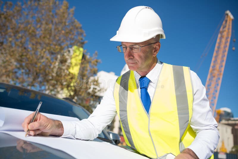 Senior engineer stock photo. Image of controlling, hardhat - 197996128