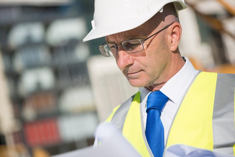Senior engineer stock photo. Image of helmet, real, plan - 61655420