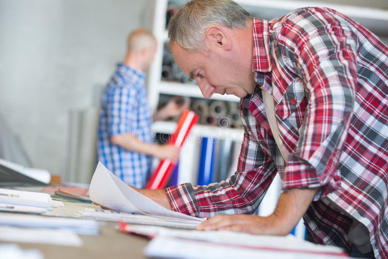 Senior Engineer Working in Office Stock Image - Image of project, read ...
