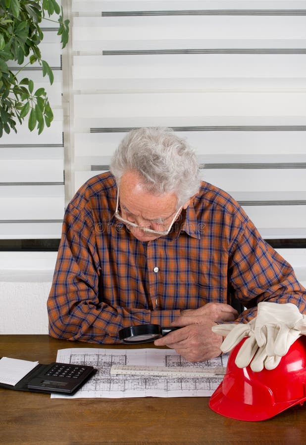 Senior engineer working stock photo. Image of building - 47465890