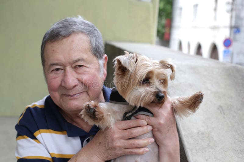 Senior Ethnic Man Holding His Lap Dog Stock Photo - Image of companion ...