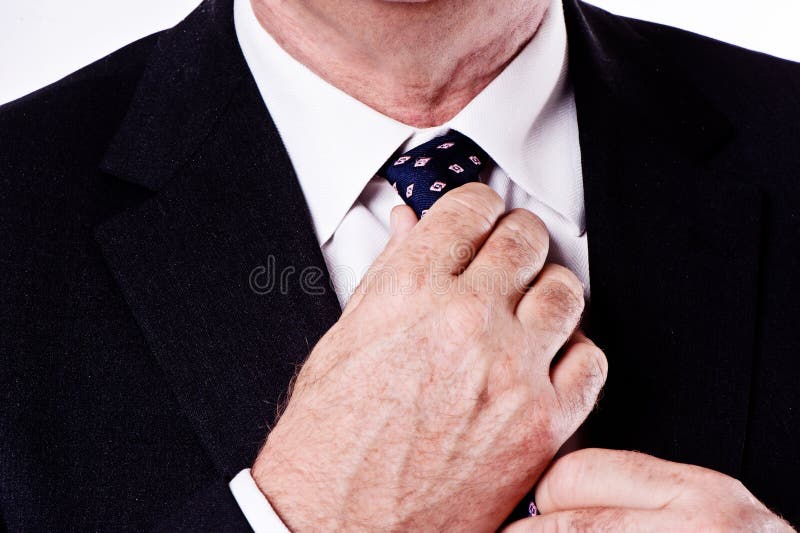 Businessman adjusting tie stock image. Image of jacket - 30214909