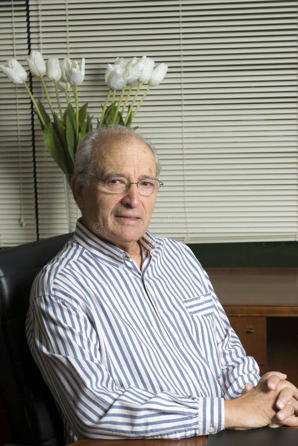 Senior executive in office stock image. Image of looking - 3001995