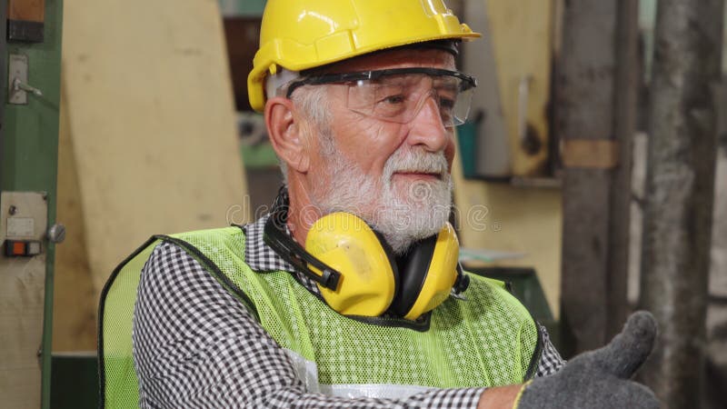 Senior Factory Worker or Engineer Close Up Portrait in Factory Stock ...