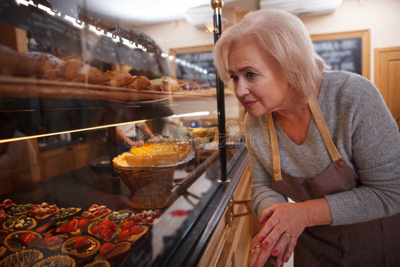 Senior Female Baker Working at Her Store Stock Image - Image of food ...