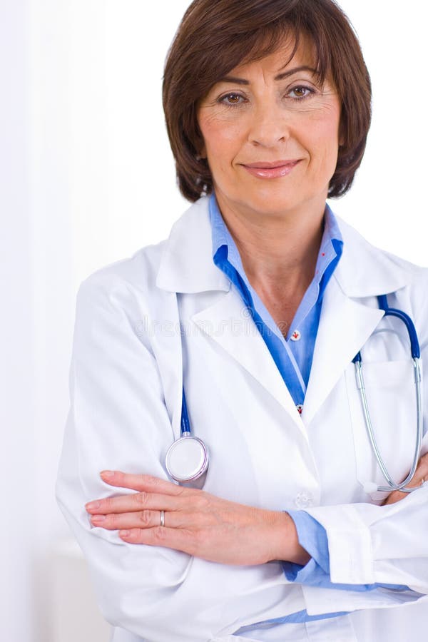 Senior Female Doctor Examining Patient Stock Photo - Image of american ...