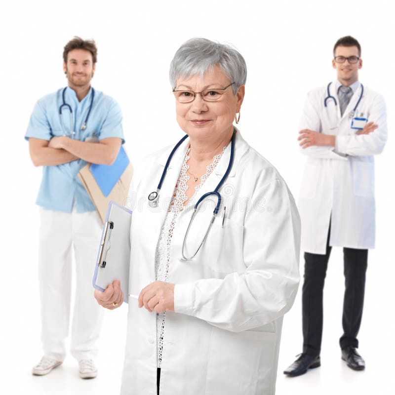 Senior Female Doctor with Medical Students Stock Photo - Image of happy ...